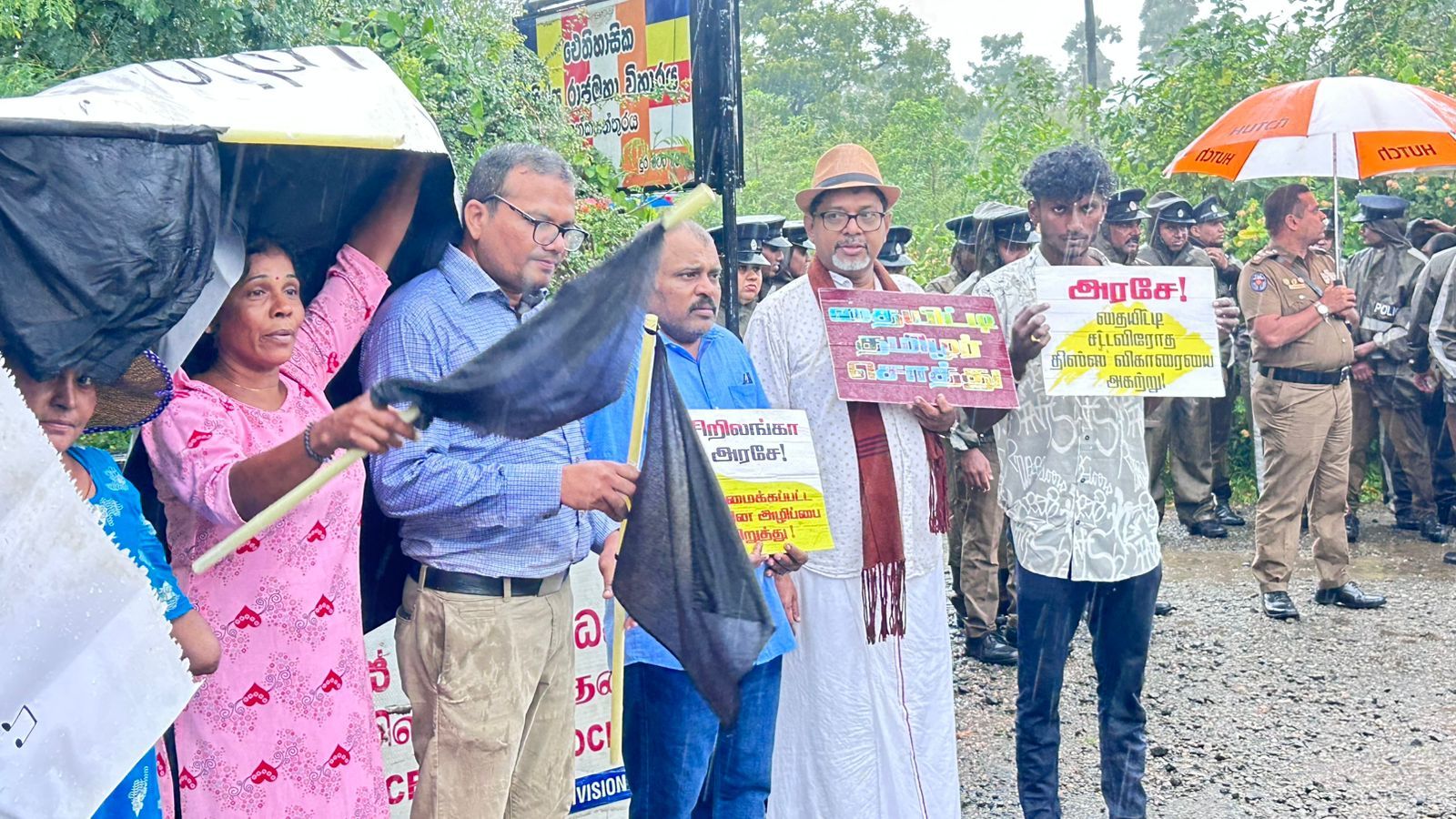 Thaiyiddy residents defy heavy rain in protest against Buddhist temple ...